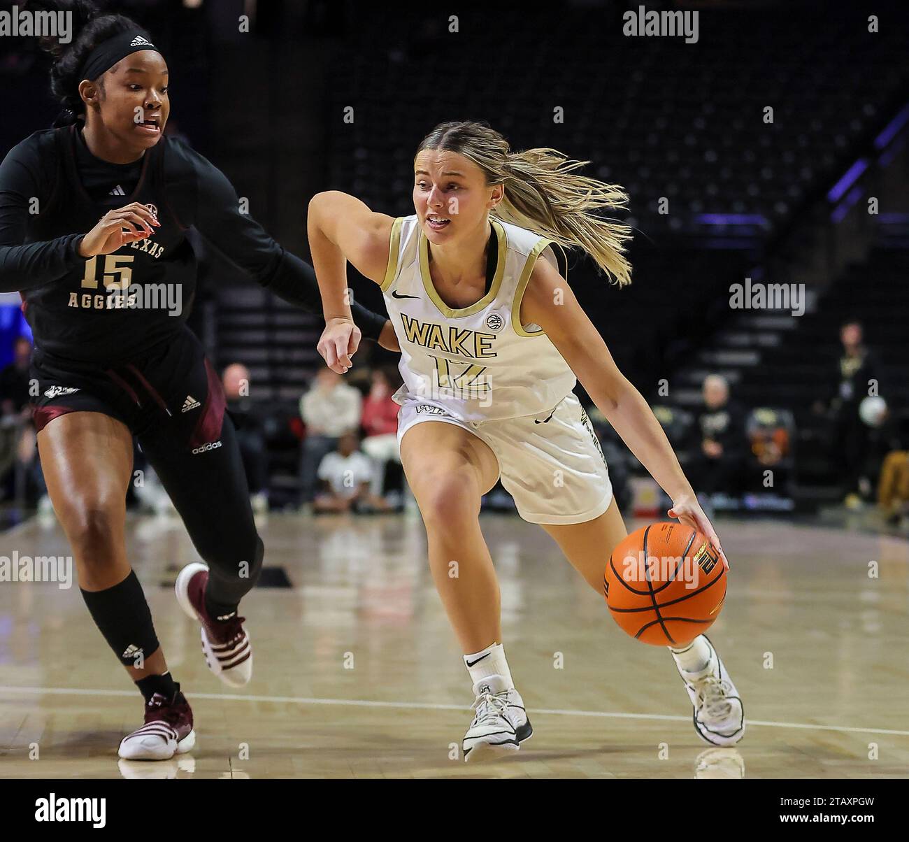 November 30, 2023: Wake Forest freshman Kate Deeble (12) drives to the ...
