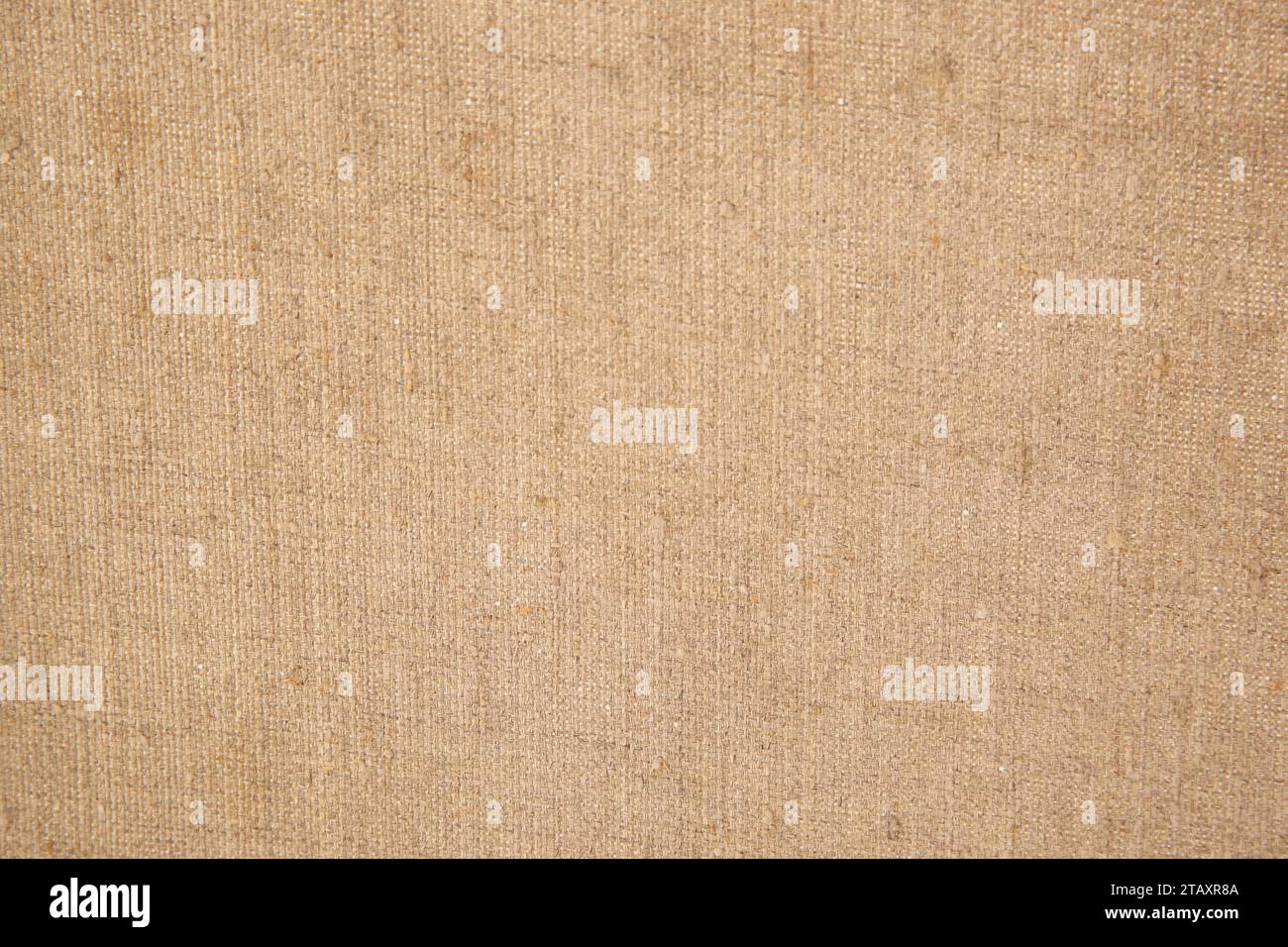 This is an image of a textured brown background made up of sacking and ...