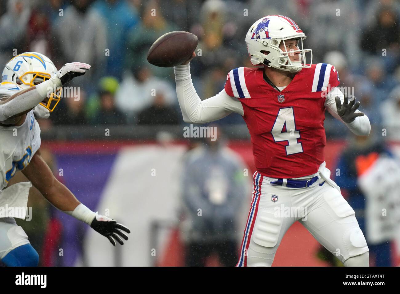New England Patriots quarterback Bailey Zappe (4) throws during the ...