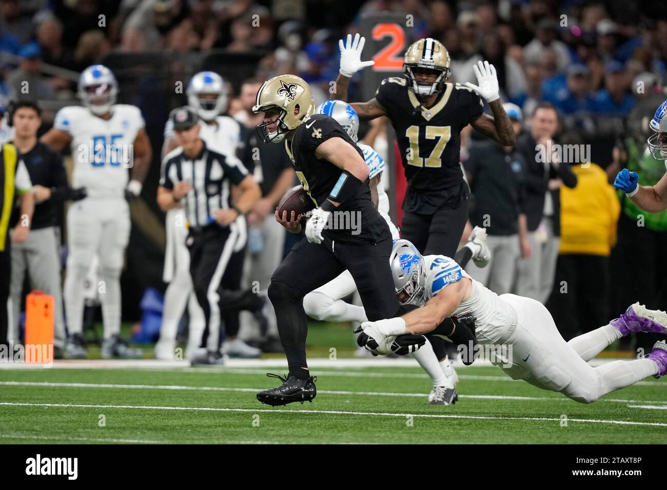 New Orleans Saints quarterback Taysom Hill (7) pulls away from Detroit ...