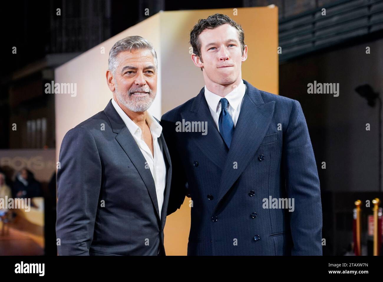 George Clooney and Callum Turner pose for photographers upon arrival at ...