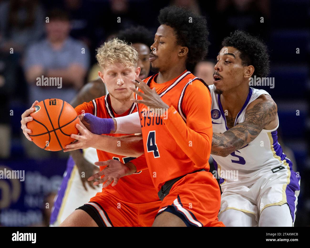 James Madison guard Terrence Edwards (5) reaches in for the steal on ...
