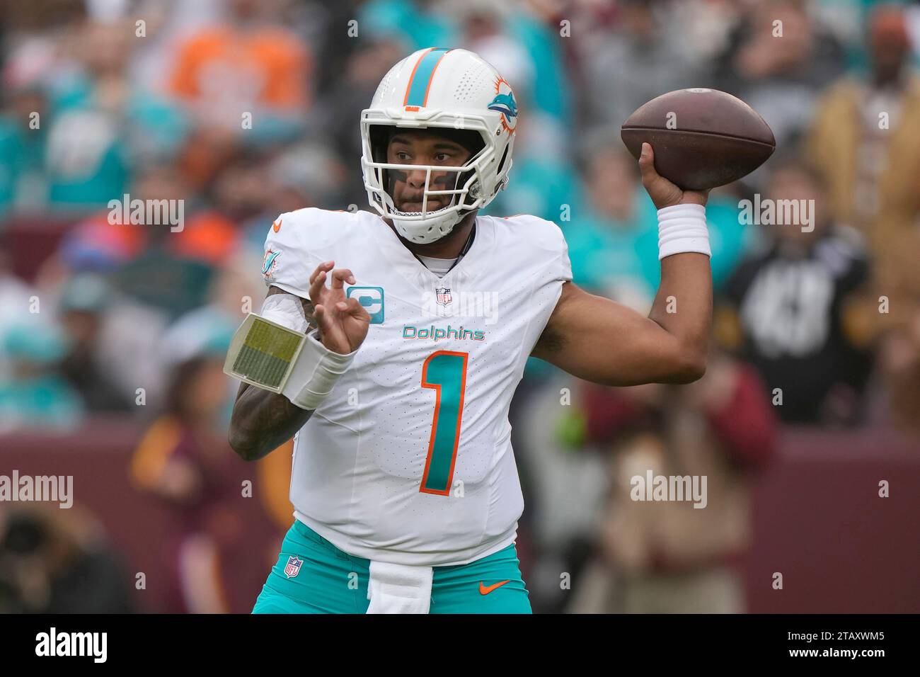 Miami Dolphins quarterback Tua Tagovailoa (1) passes against the Washington Commanders during ...