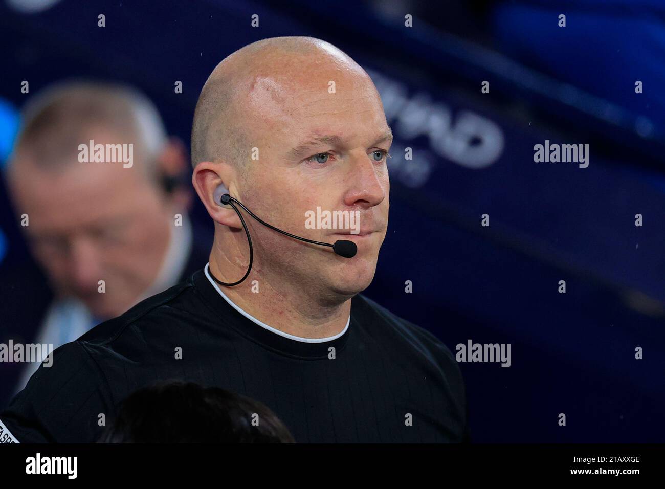 Manchester, UK. 03rd Dec, 2023. Referee Simon Hooper ahead of the ...