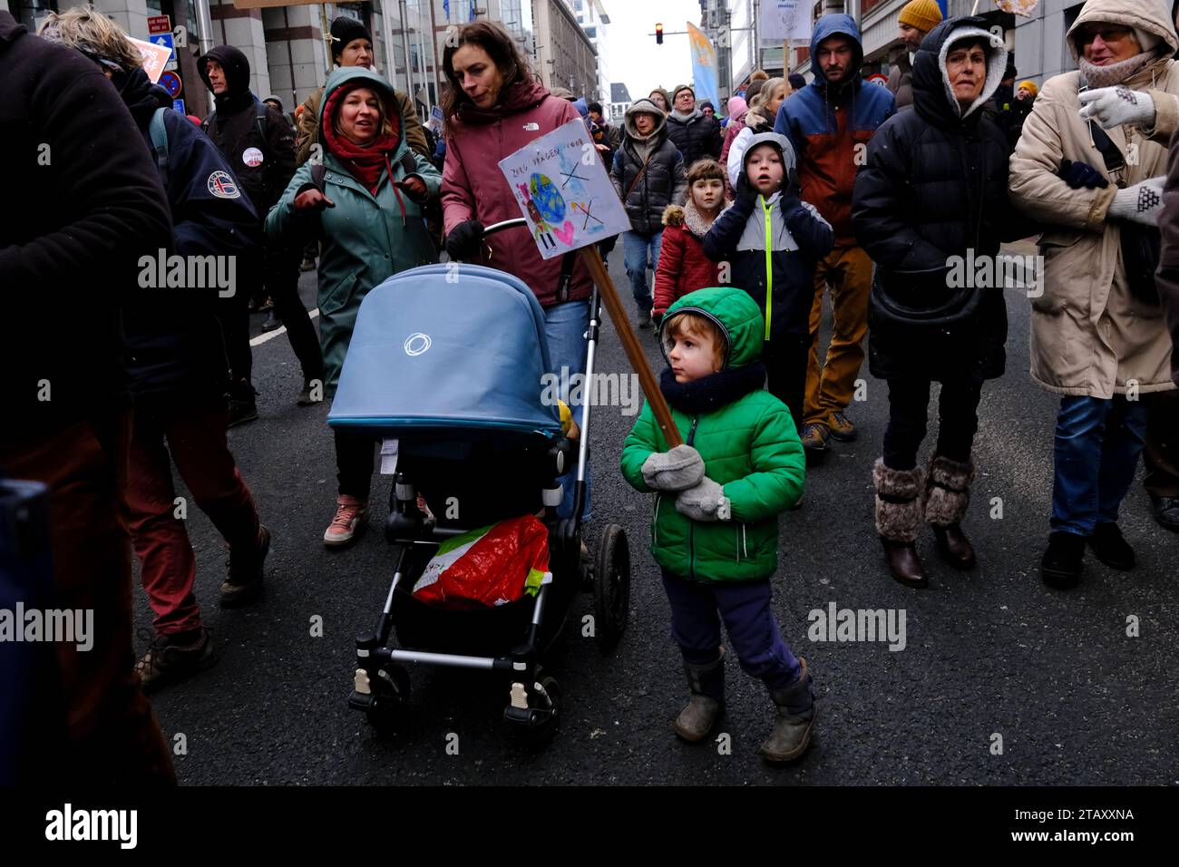 Brussels, Belgium. 03rd Dec, 2023. People take part in a climate ...