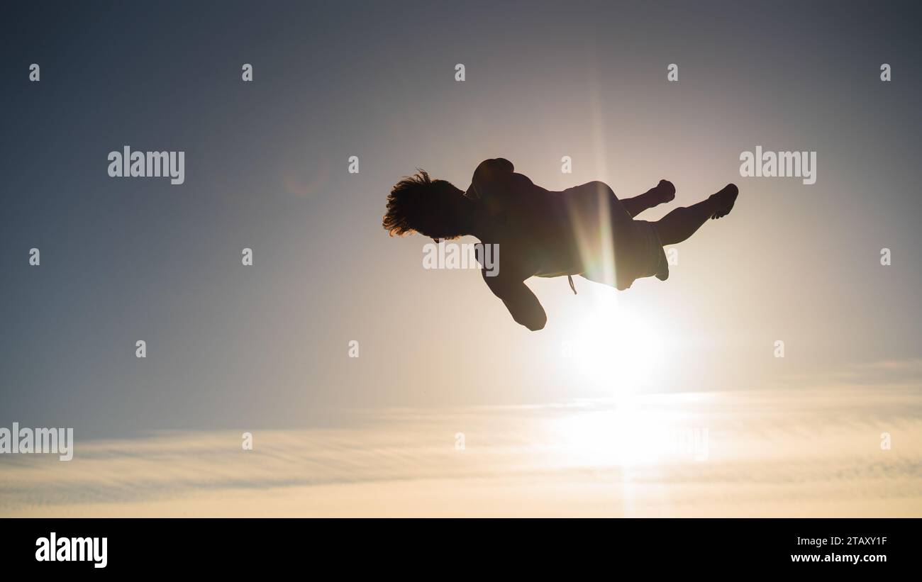 Silhouette gymnast in sunset hi-res stock photography and images - Alamy