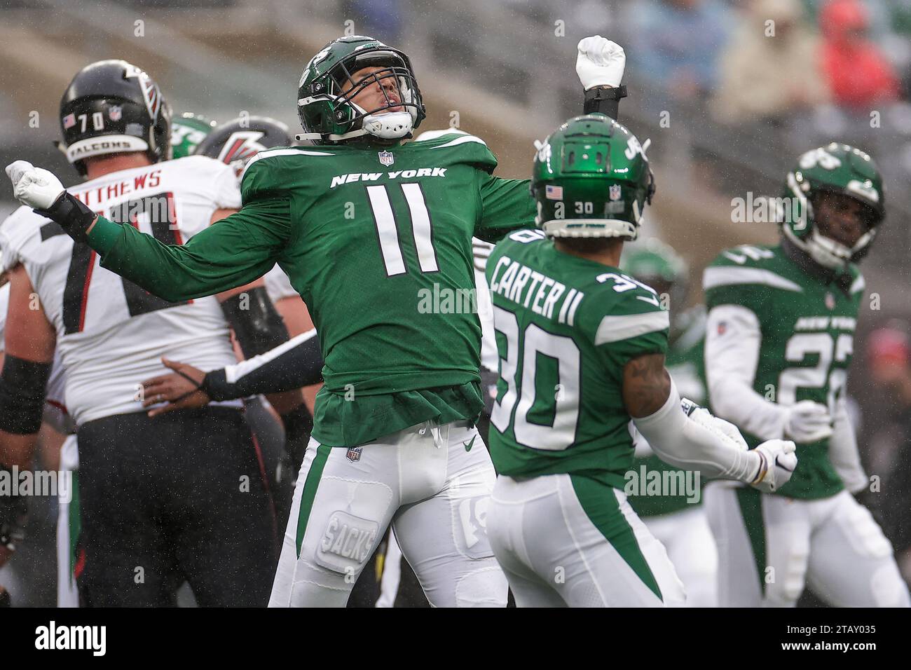 New York Jets linebacker Jermaine Johnson (11) reacts during the first ...