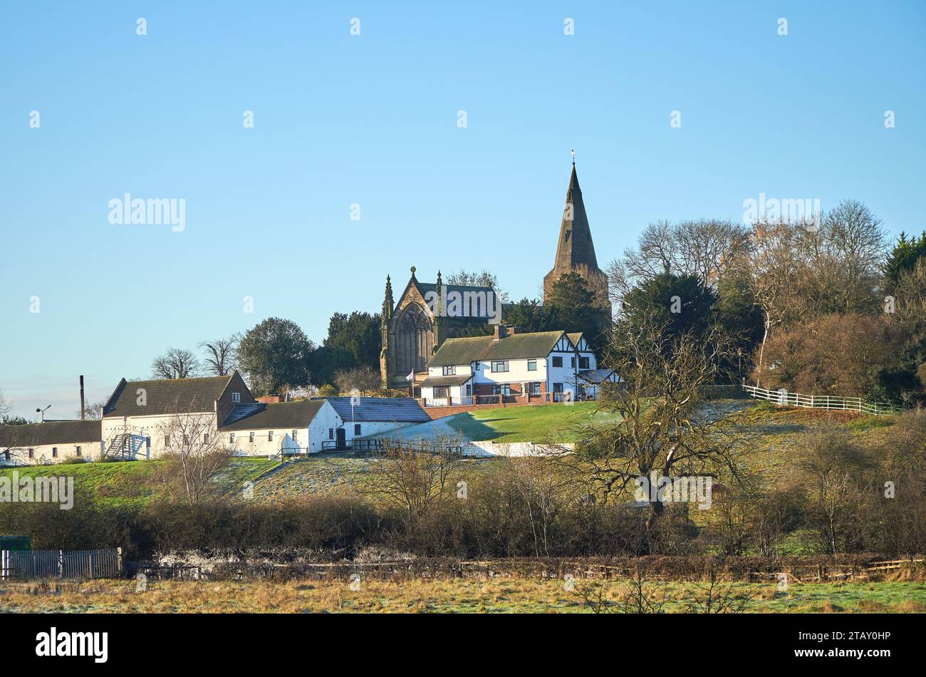 Church and farm house on a hillside in Sandiacre, Nottinghamshire, UK ...