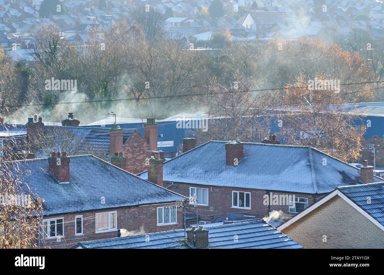 Steam rising from rooftops in winter Stock Photo - Alamy
