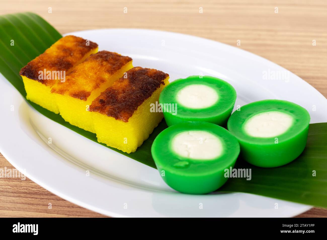 Malaysian dessert kuih Nona Manis and kuih bingka ubi or Baked Tapioca ...