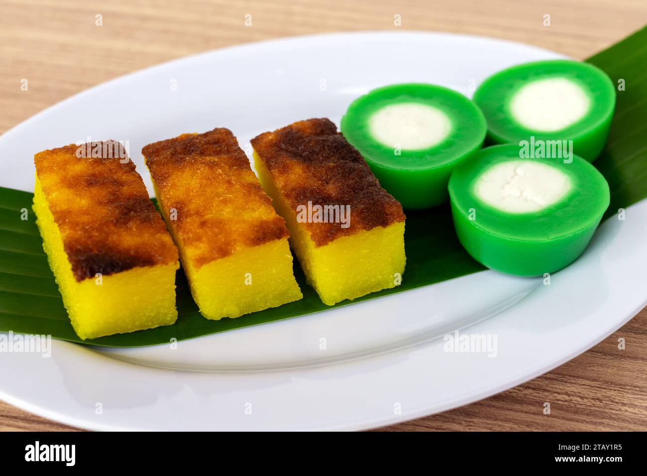 Malaysian dessert kuih Nona Manis and kuih bingka ubi or Baked Tapioca ...