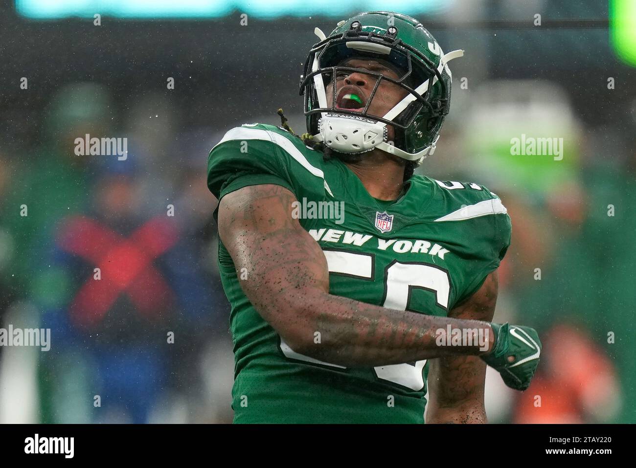 New York Jets linebacker Quincy Williams (56) reacts against the ...