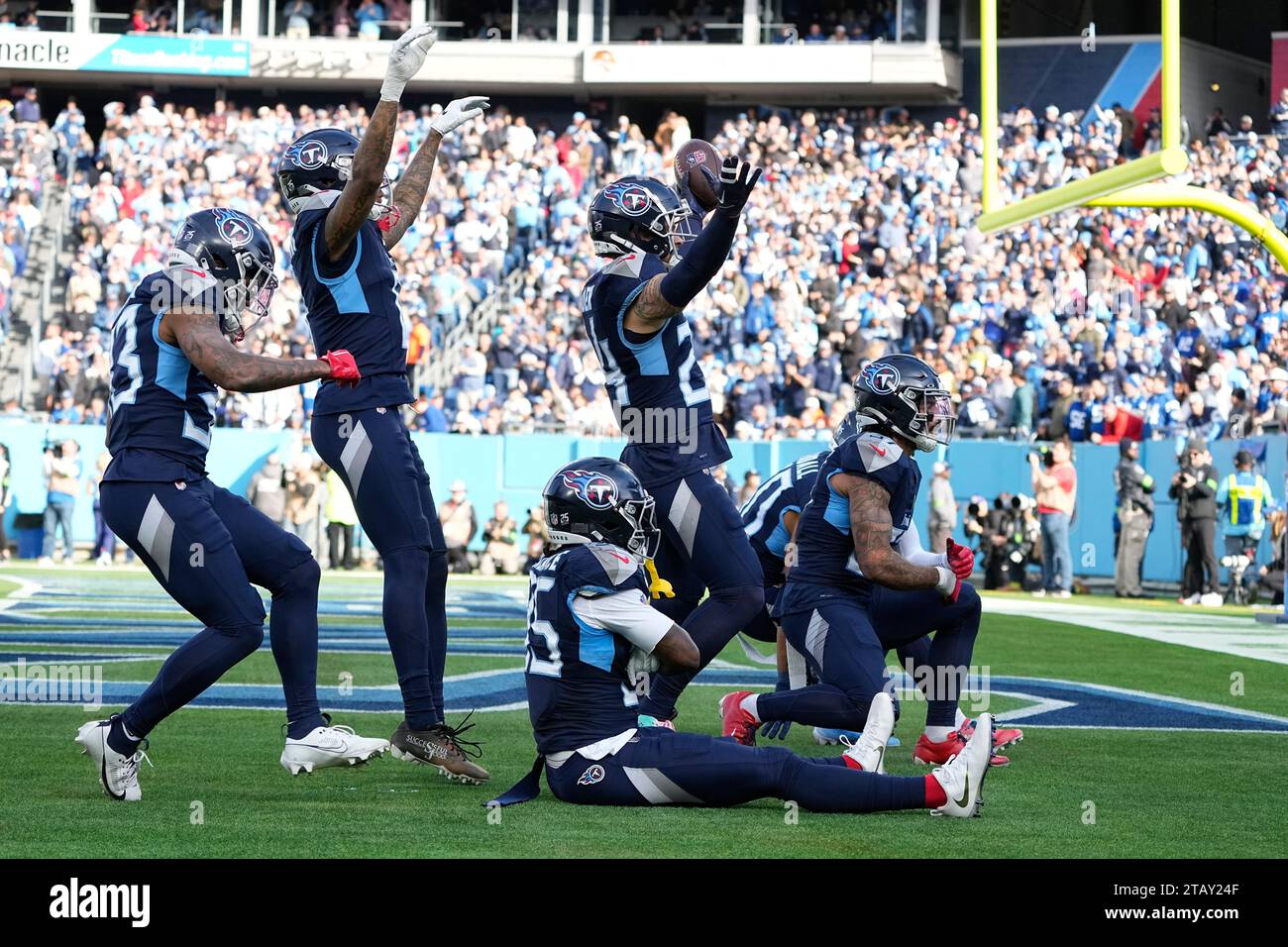 Tennessee Titans' Elijah Molden (24) celebrates a fumble recovery ...