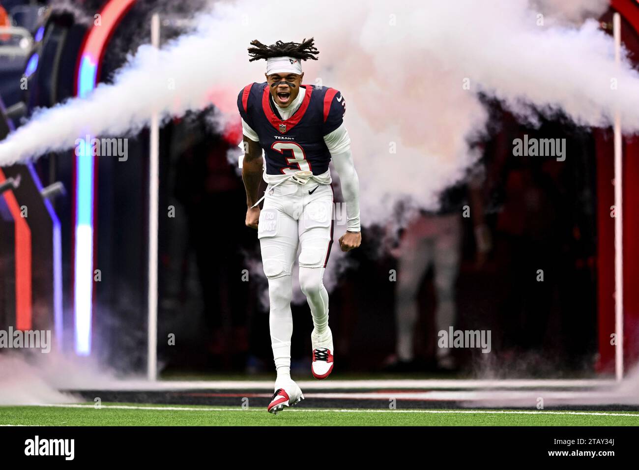 Houston Texans wide receiver Tank Dell (3) runs out onto the field ...