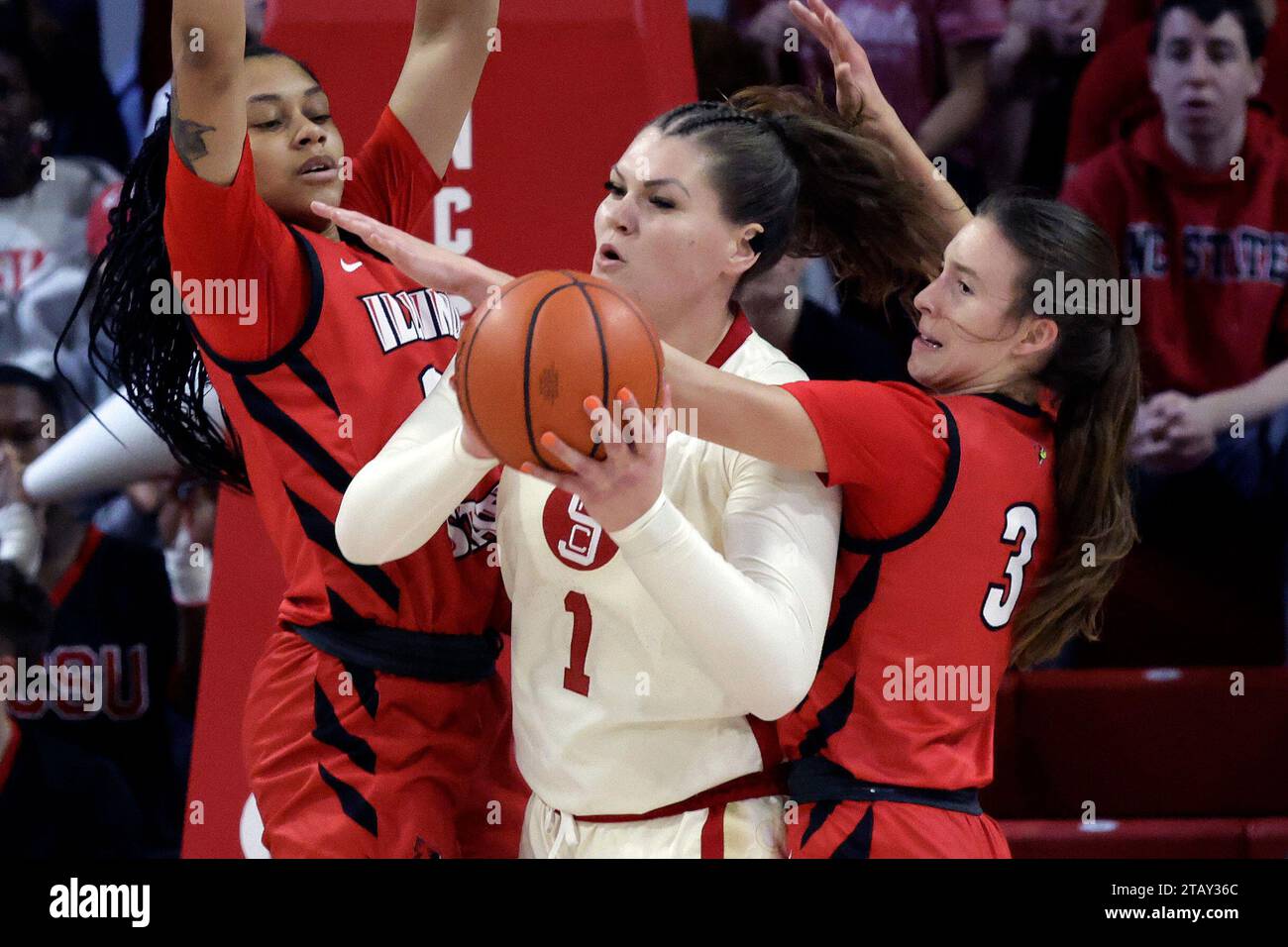 North Carolina State center River Baldwin (1) is defended by Illinois ...