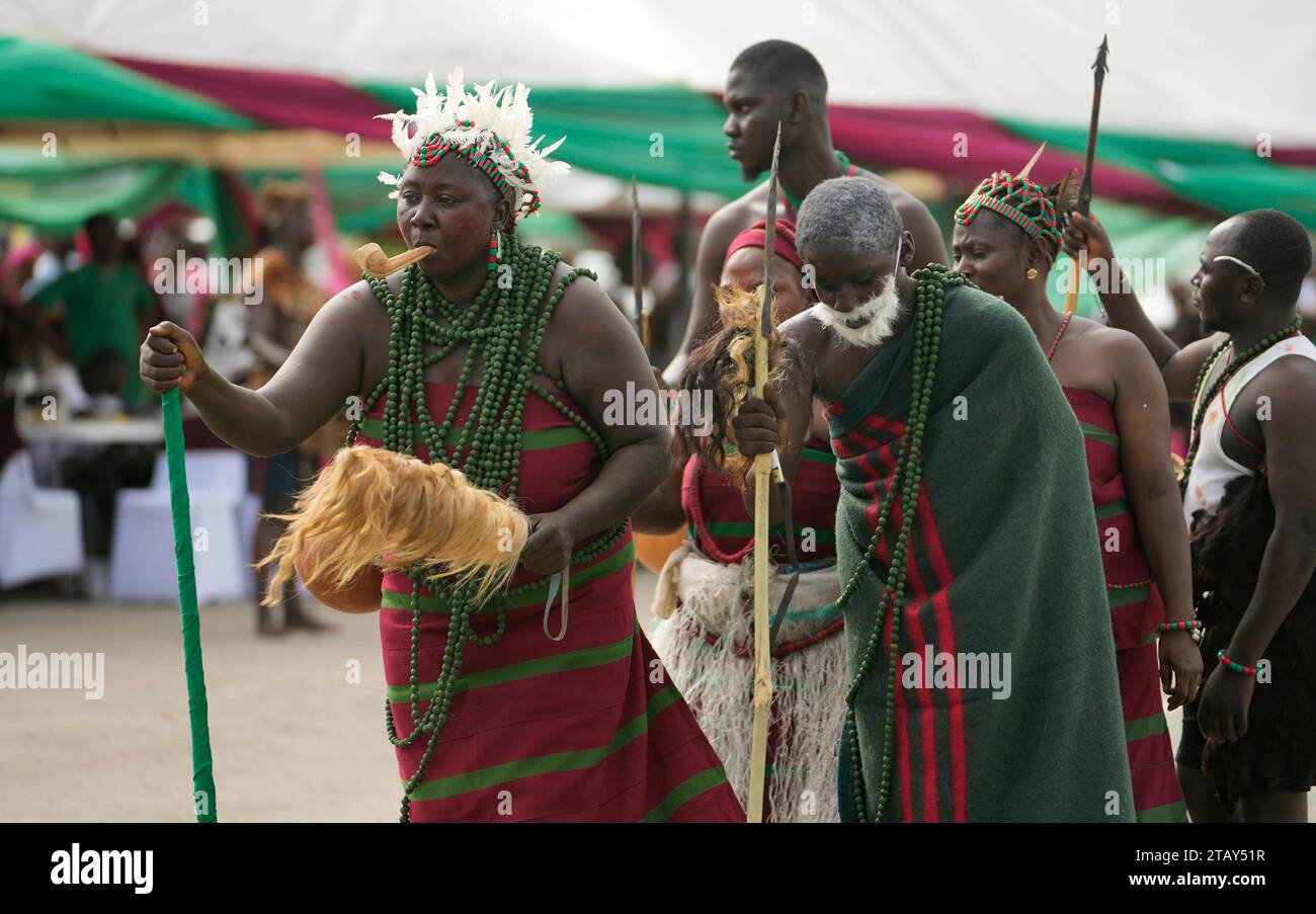 People dressed in traditional clothes perform, during the annual ...
