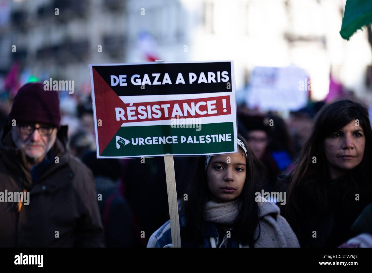 Paris, France. 02nd Dec, 2023. A woman holds a placard that says ...