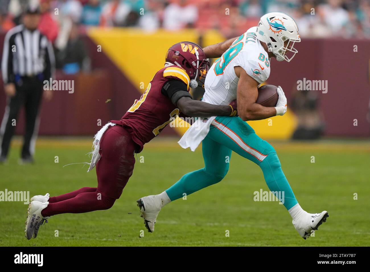 Miami Dolphins tight end Julian Hill, right, runs against Washington ...