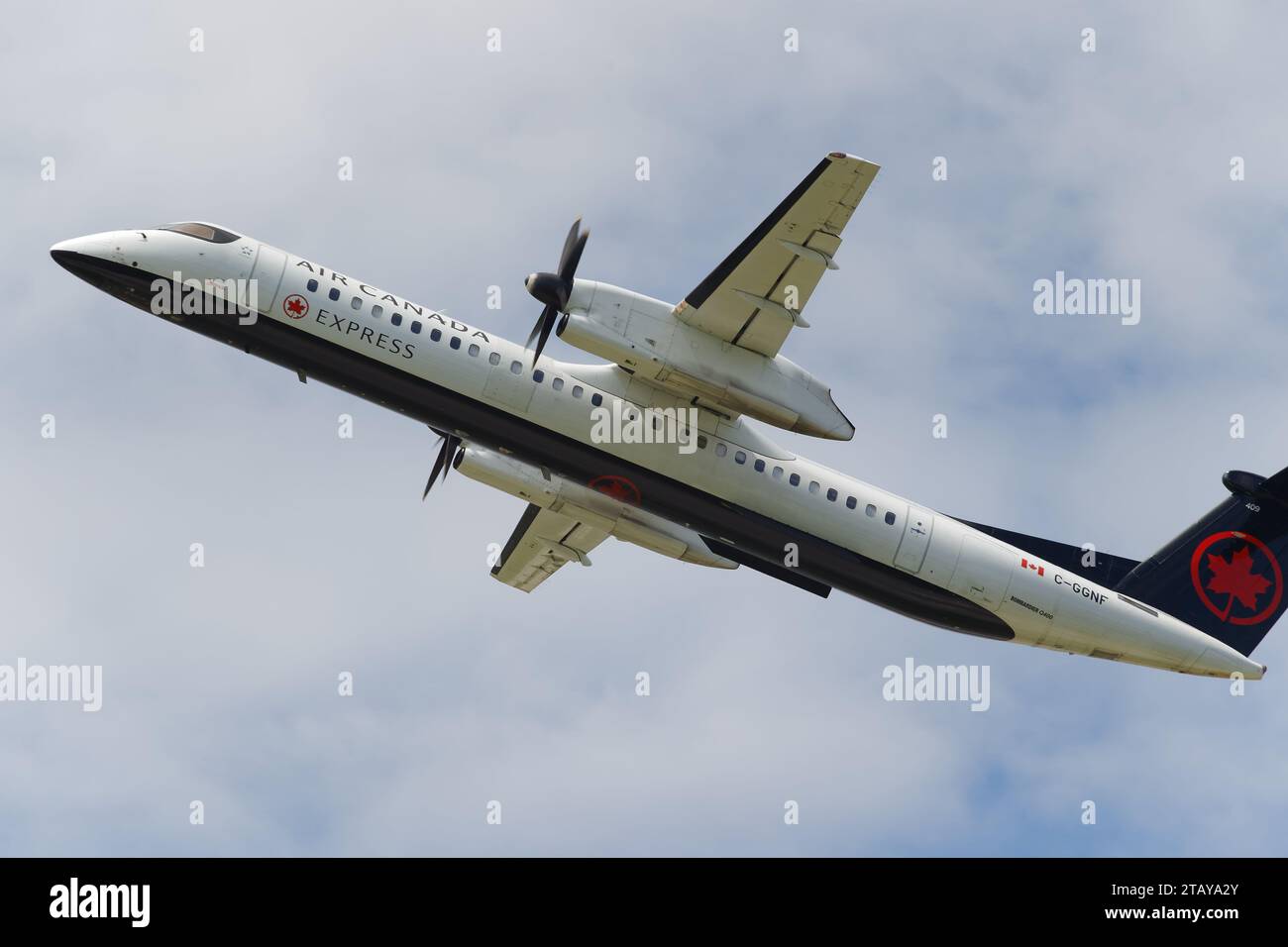 Air Canada Express Bombardier Q400 aircraft in takeoff. Montreal,Quebec ...