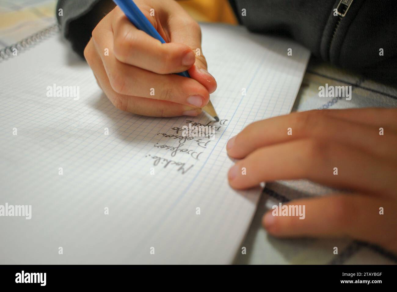 Education in Action: Kid Doing Homework Stock Photo - Alamy