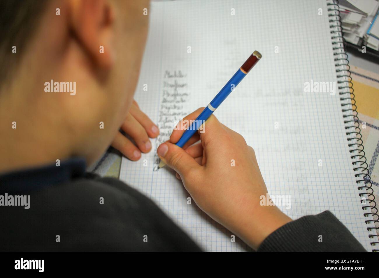 Kid doing homework hi-res stock photography and images - Alamy