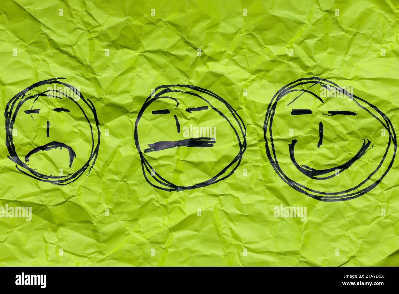 Hand-Drawn Smiley Emotions on Colored Paper Stock Photo - Alamy