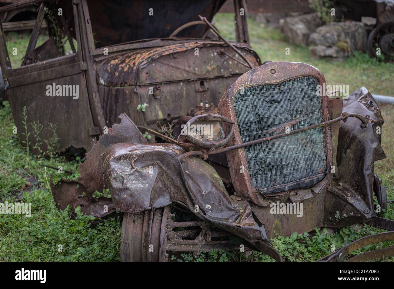 Detail of the front of an old Ford Model A completely destroyed in an ...