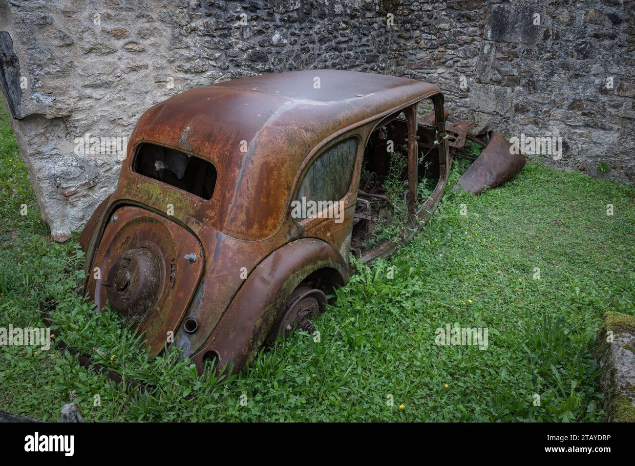 Rear view of an old Citroen Traction Avant B11 Familiale abandoned and ...