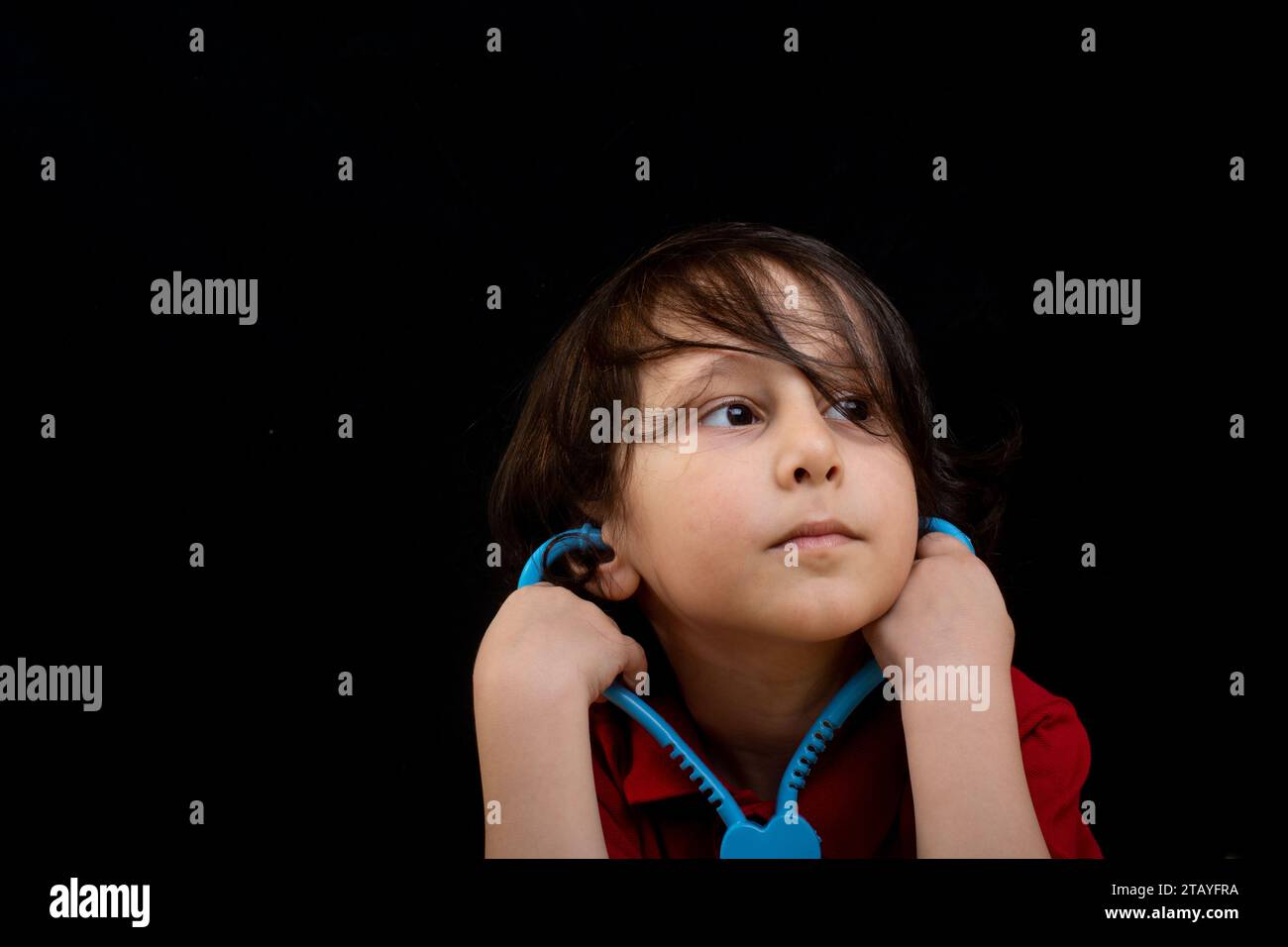 intelligent little boy future doctor holds stethoscope Stock Photo - Alamy