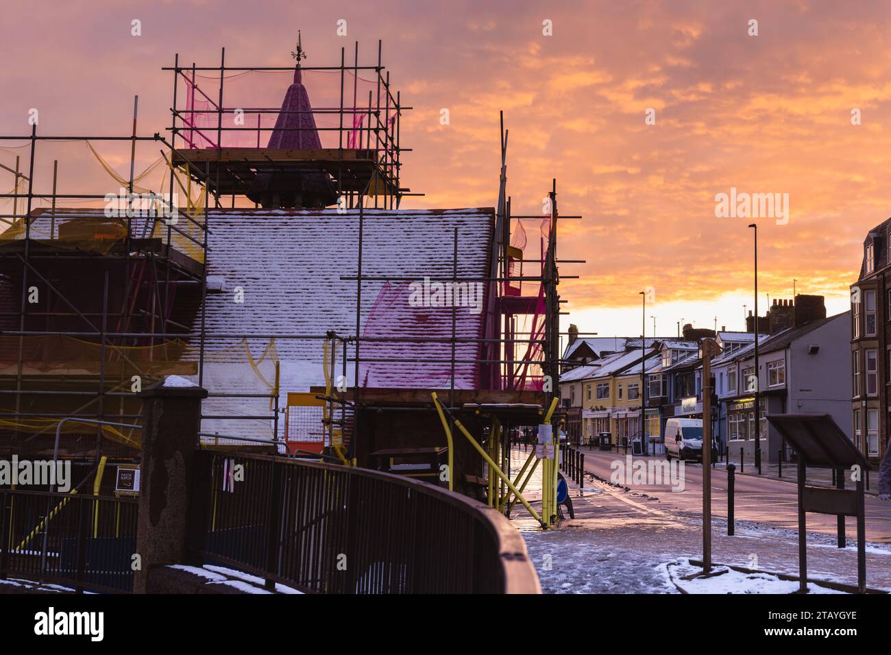 Sunset with orange skies with Cullercoats Watch House in the front ...