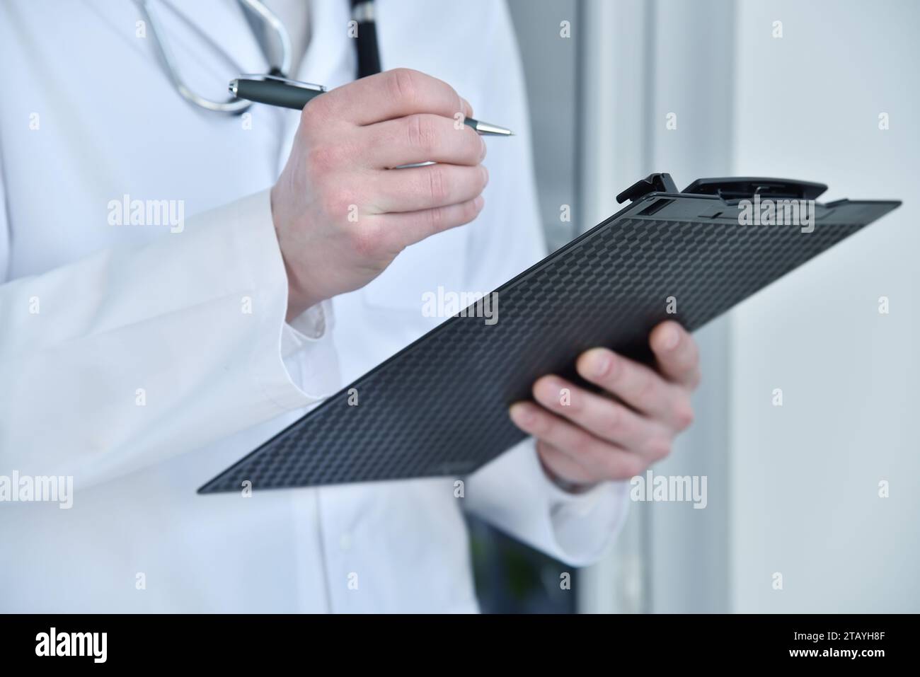 Clipboard doctor patient closeup hi-res stock photography and images ...
