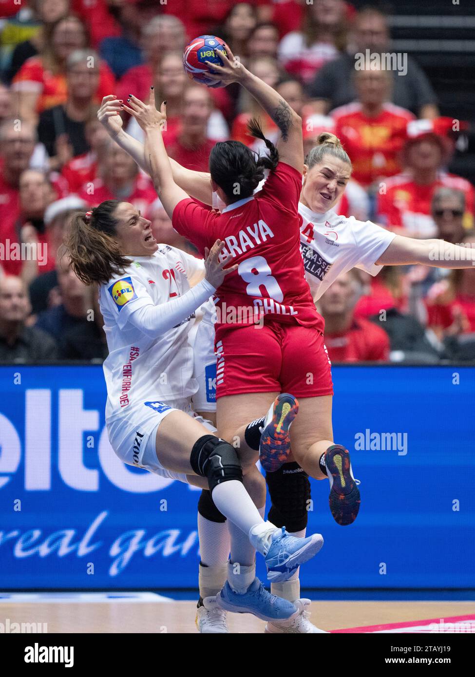Denmark's Louise Vinter Burgaard and Rikke Iversen tackle Chile's ...