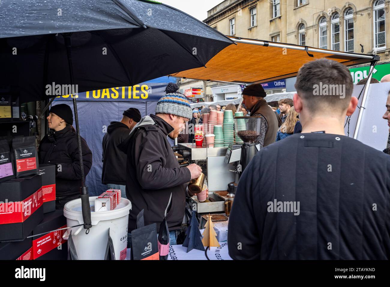 Coffee stall and barista making coffee at Frome Christmas Sunday Market ...