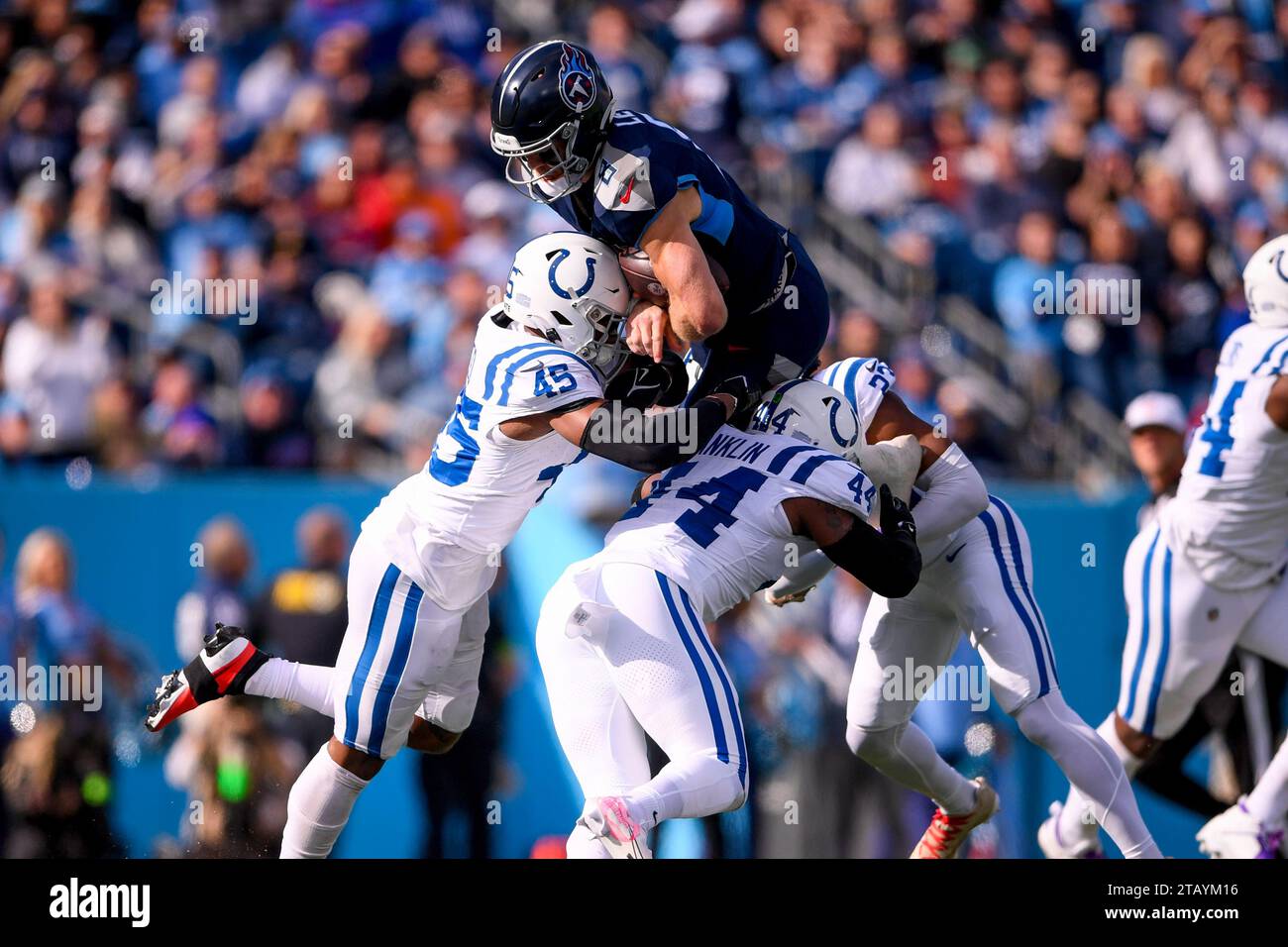 December 3, 2023: Tennessee Titans quarterback Will Levis (8) hurdles over Indianapolis Colts ...