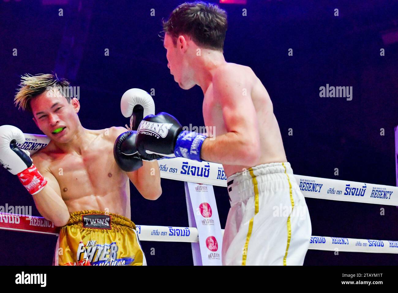 Bangkok, Thailand. 02nd Dec, 2023. Professional boxer Giuliano Fantone (right) handed popular ...