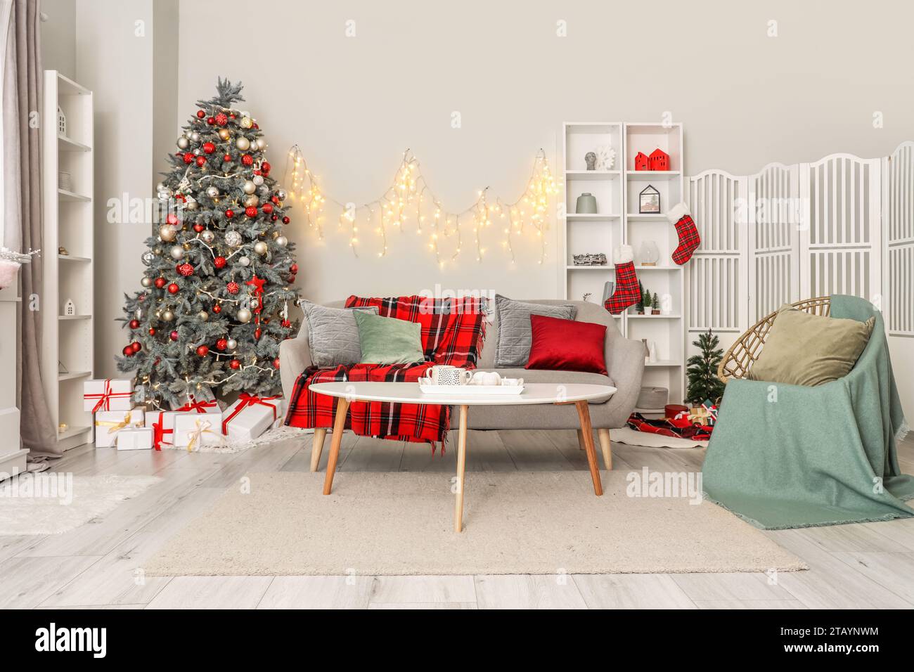 Interior of living room with sofa, armchair and Christmas tree Stock ...