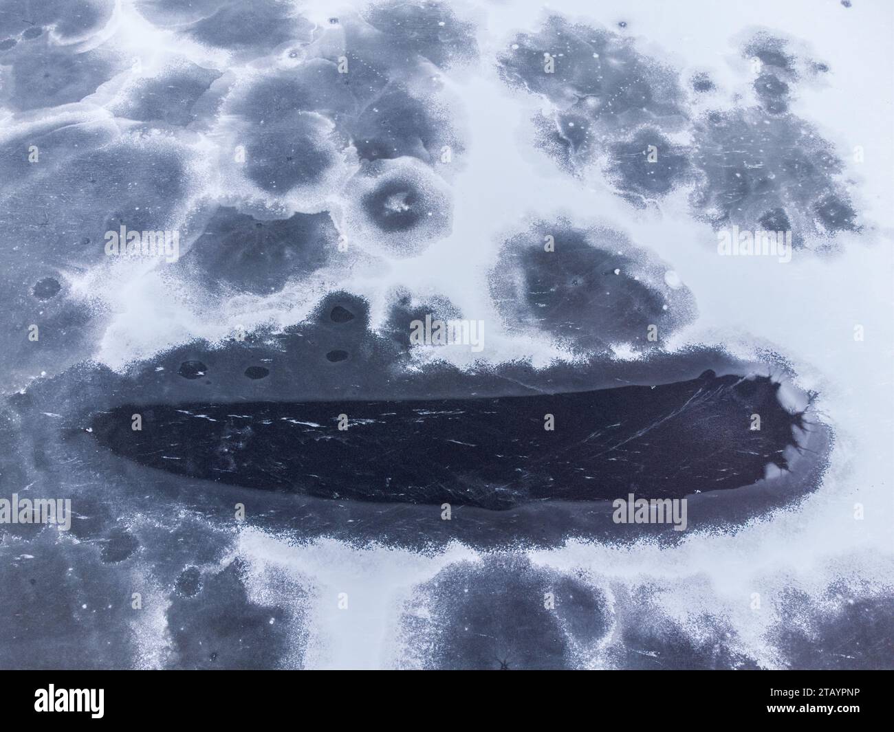 View of the frozen lake from above. Structural craters, water ice ...
