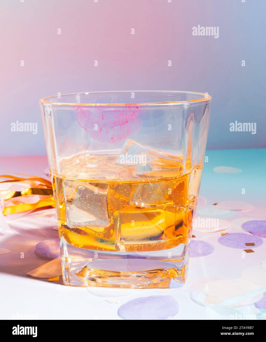 A Close Up of a Whiskey Scotch on the Rocks with Lipstick Stain on the Glass Stock Photo - Alamy