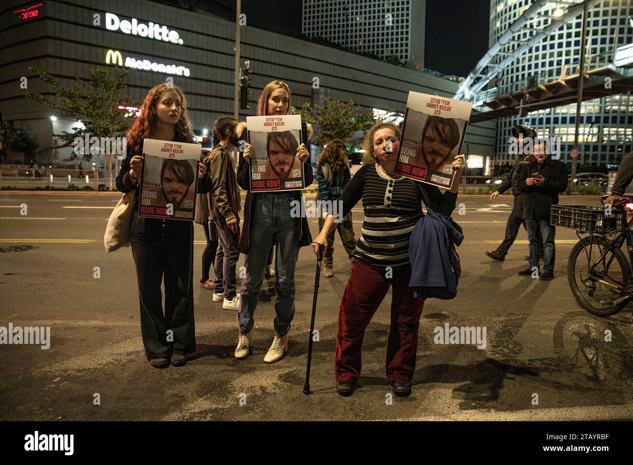 Tel Aviv, Israel. 02nd Dec, 2023. Russian Israelis hold posters for the ...