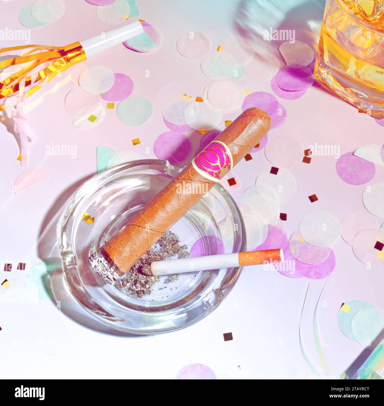 A Cigarette and a Cigar in an Ashtray and Confetti in an Morning After ...