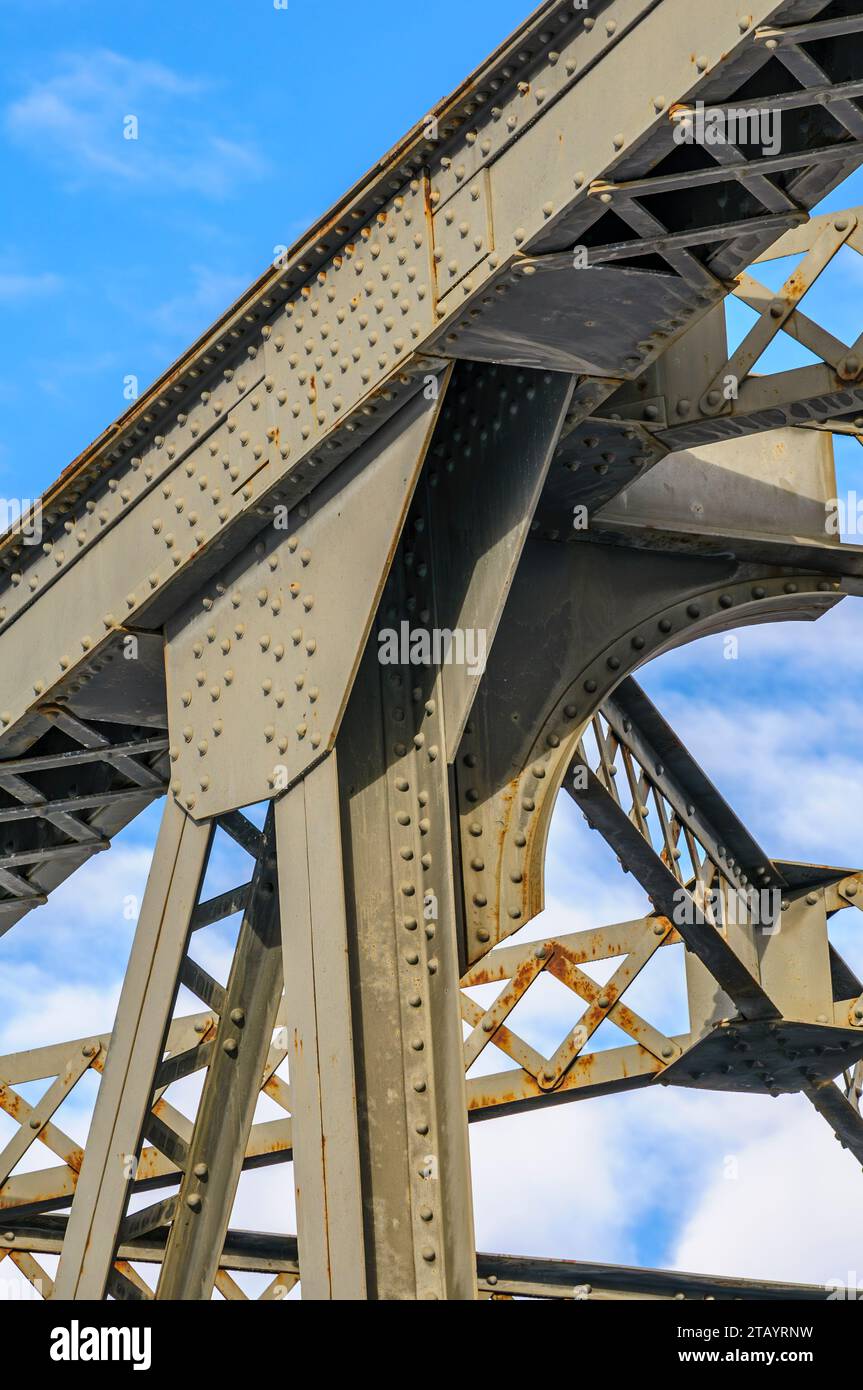 Grey iron beams and trusses forming part of the structure of a railroad ...