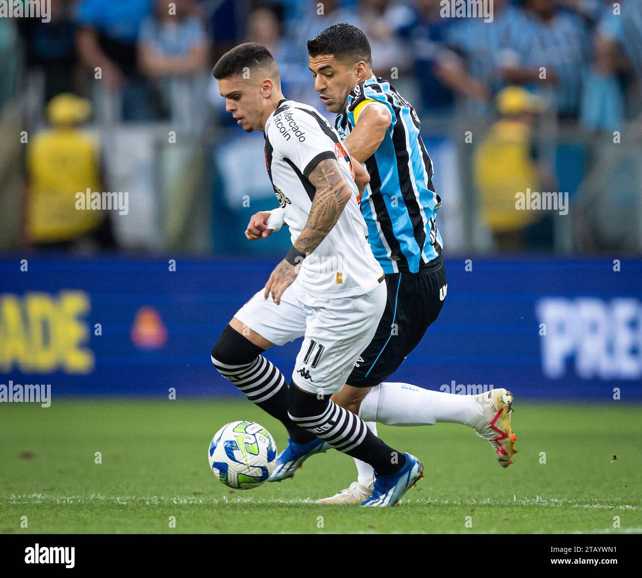 Porto Alegre, Brazil. 03rd Dec, 2023. Luis Suarez of Gremio battles for ...