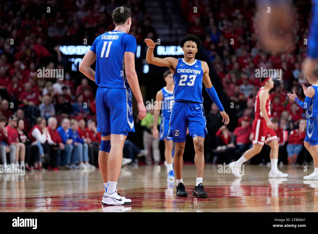 Creighton guard Trey Alexander (23) celebrates with teammate center ...