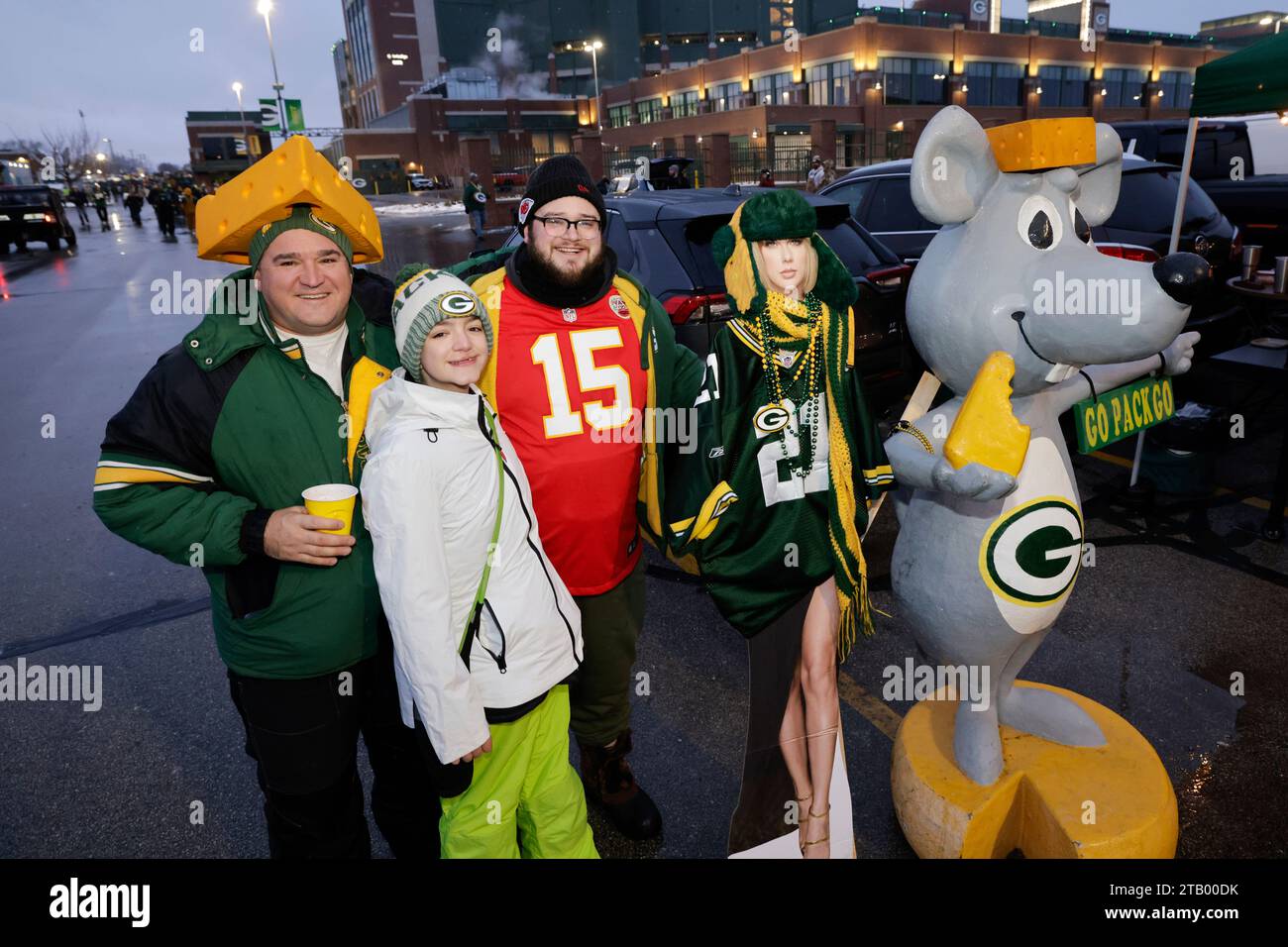 Green Bay Packers fan David Till, from left, and his son's Dane and ...
