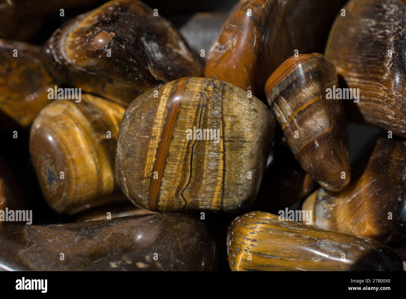 tiger's eye and hawk's eye gemstone as natural mineral rock specimen ...