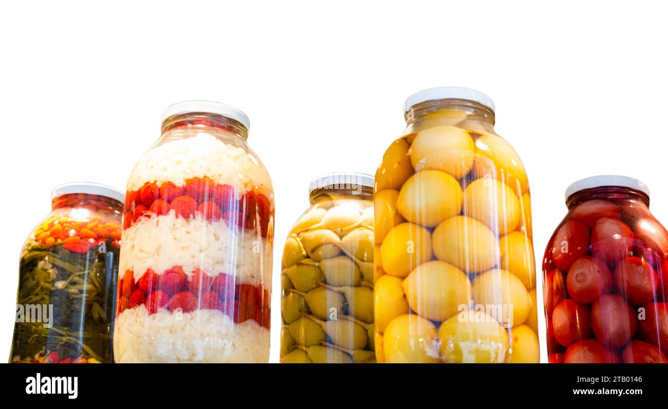 Jars preserved vegetables. Canned food in glass jars. Grocery conserve ...
