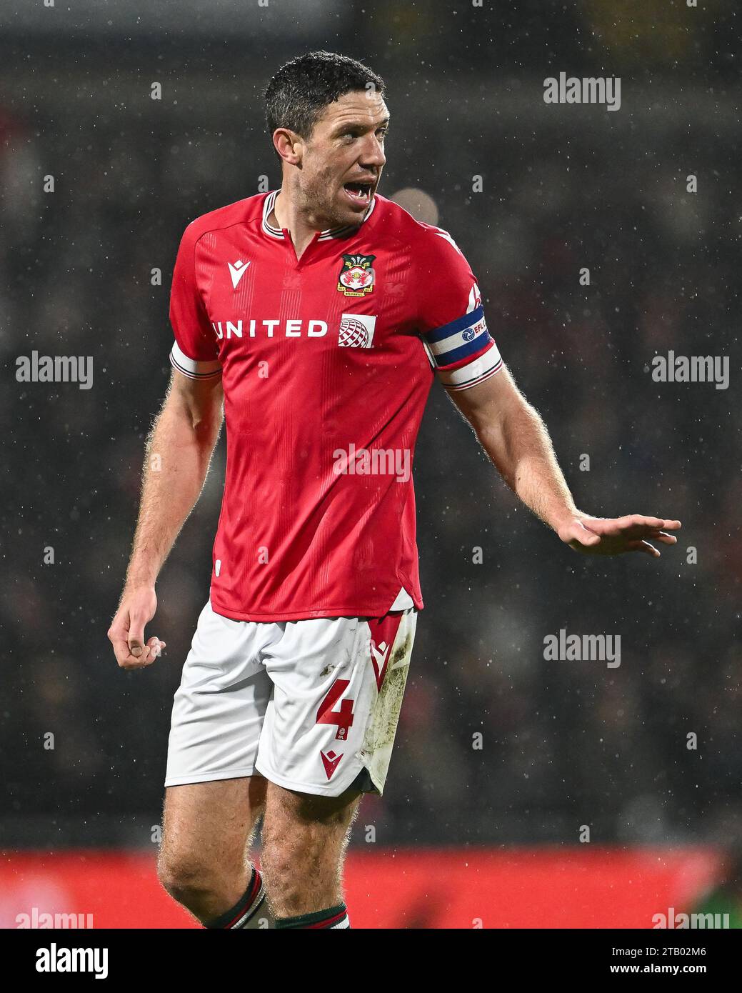 Ben Tozer #4 of Wrexham gives his team instructions during the Emirates ...
