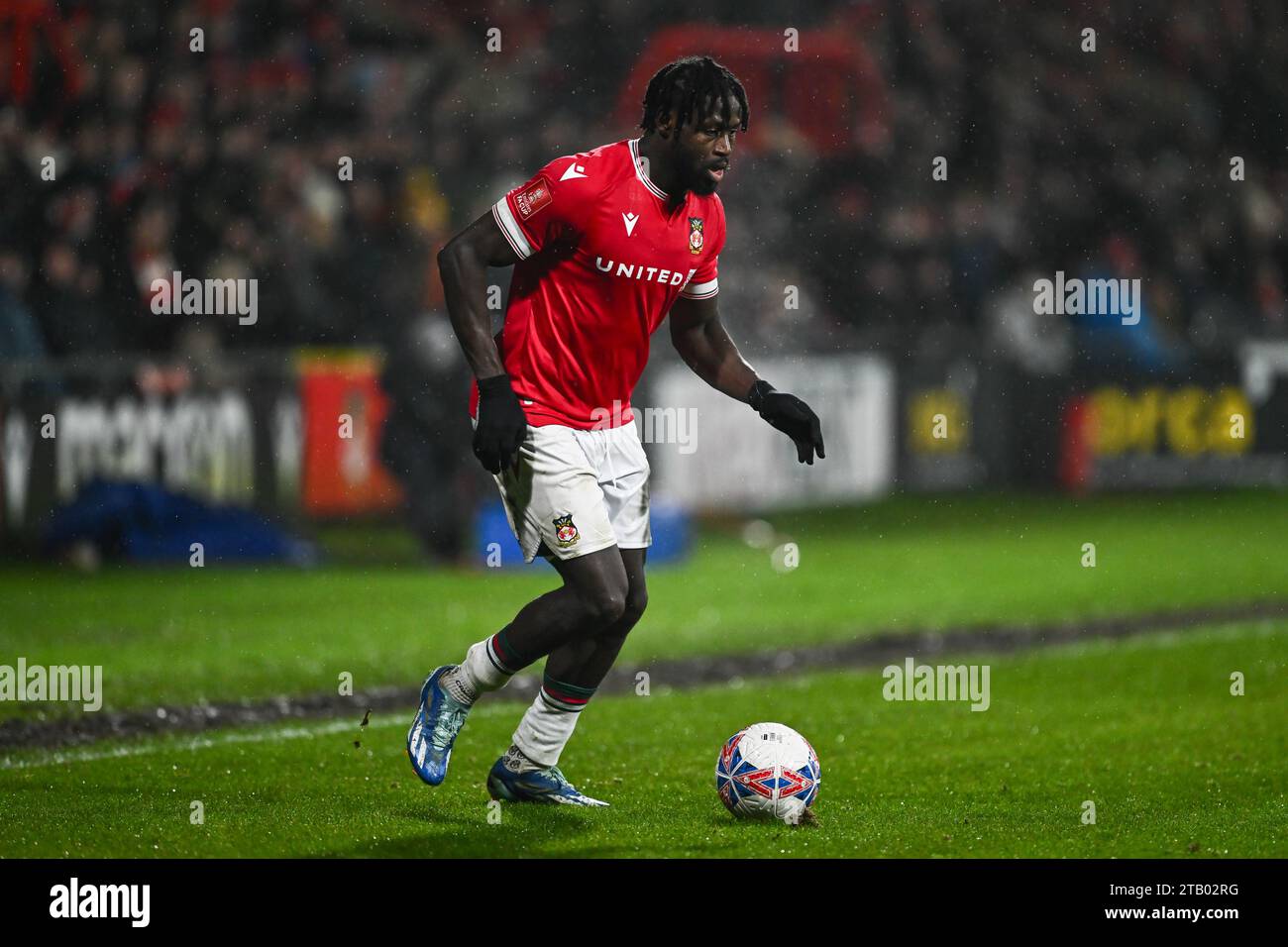 Jacob Mendy #19 of Wrexham in action during the Emirates FA Cup match ...