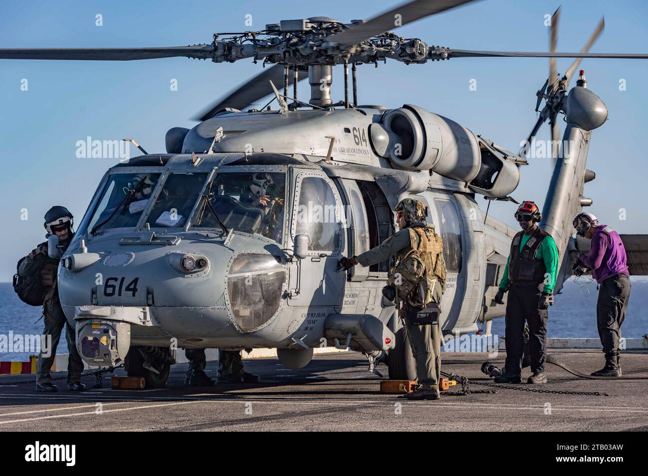 231202-N-LM220-1231 PACIFIC OCEAN (Dec. 2, 2023) Sailors prepare to ...