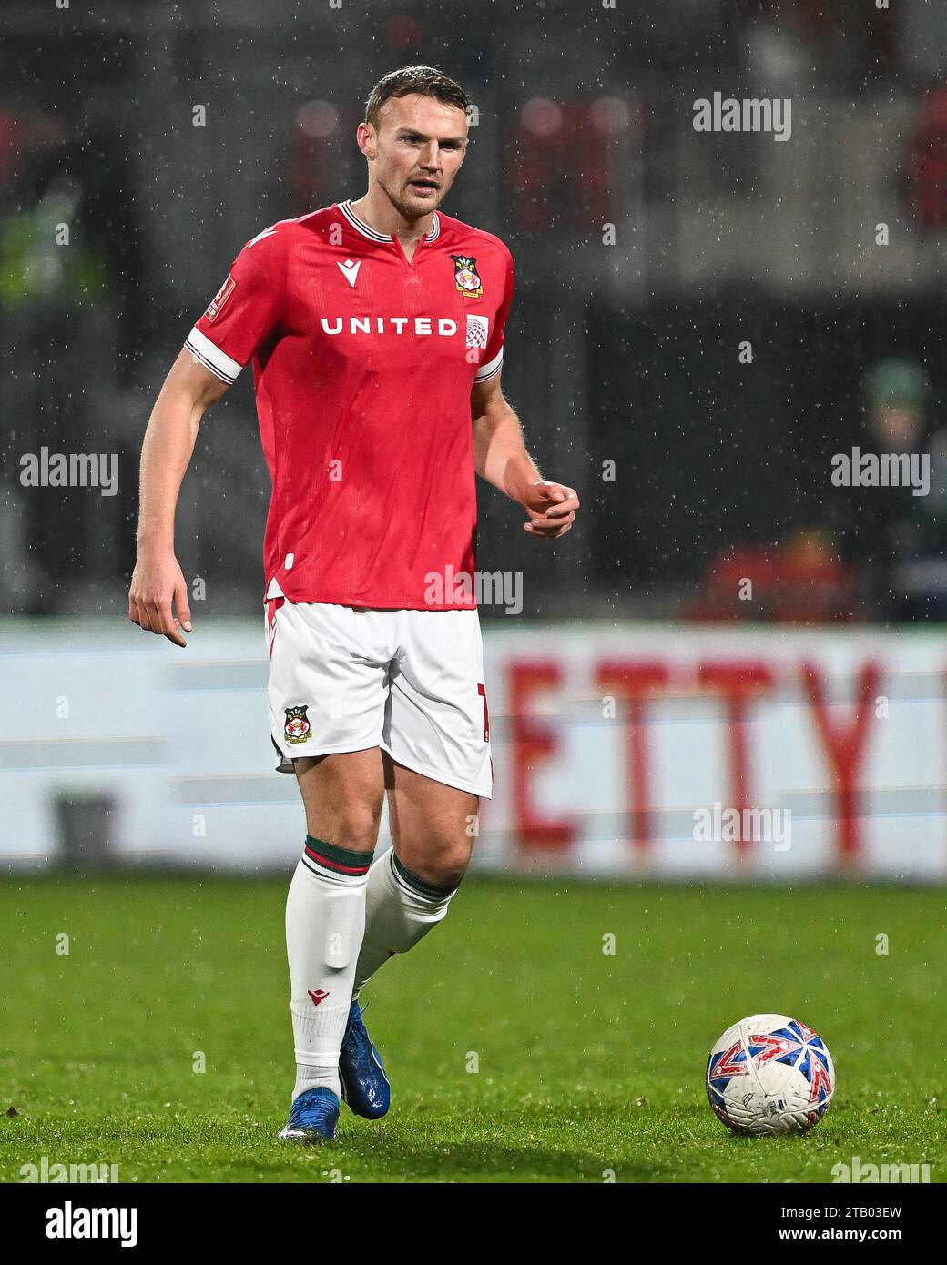 Sam Dalby #18 of Wrexham in action during the Emirates FA Cup match ...